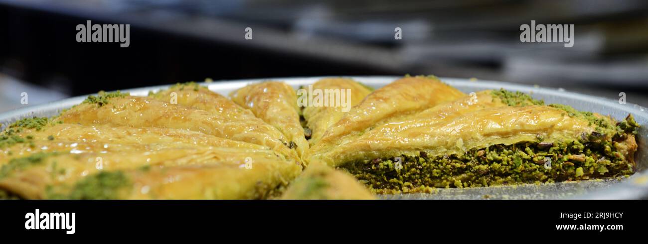 Different kind of Baklawas displayed in a traditional pastry sweet shop ...
