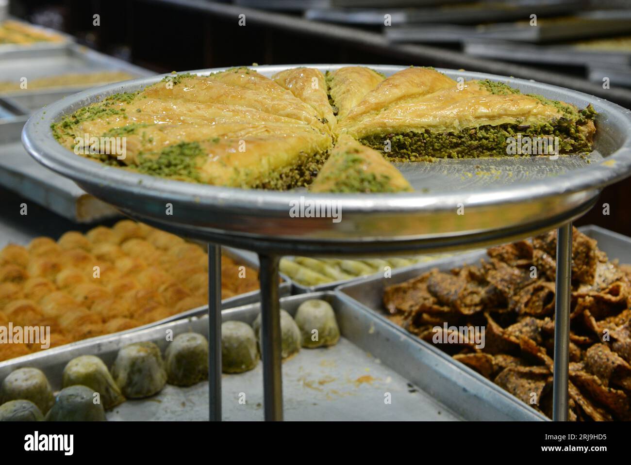 Different kind of Baklawas displayed in a traditional pastry sweet shop ...