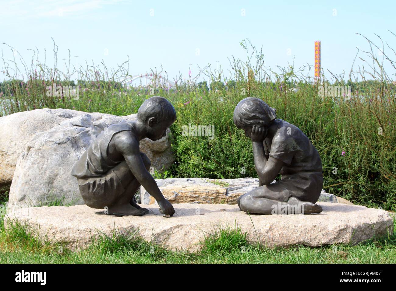 children playing games, closeup of stone carving works Stock Photo - Alamy