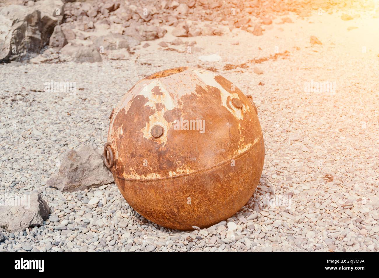 Old rusty sea mine on the beach Stock Photo - Alamy