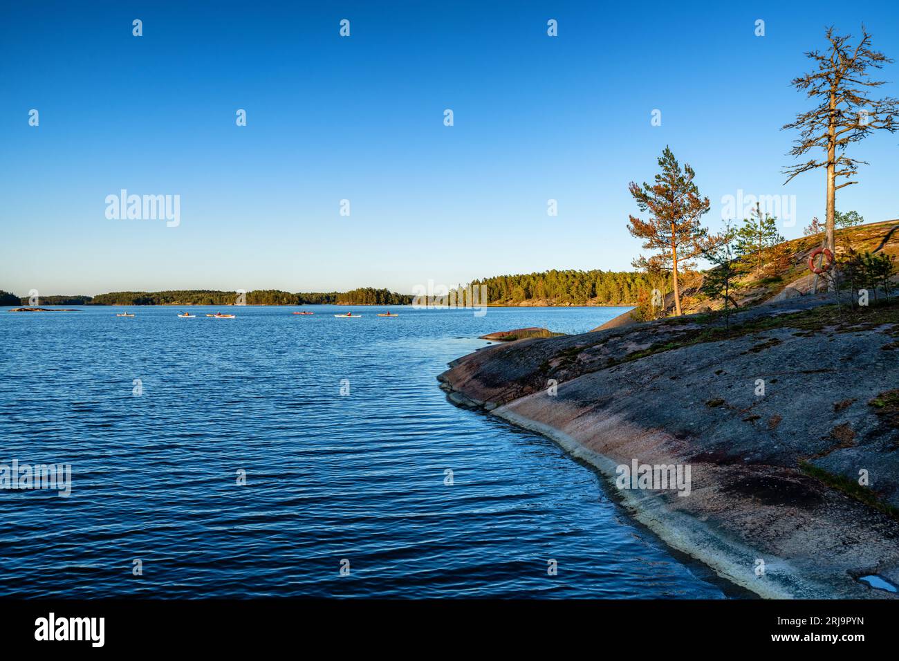 Kayakers next to Linlo island, Kirkkonummi, Finland Stock Photo - Alamy