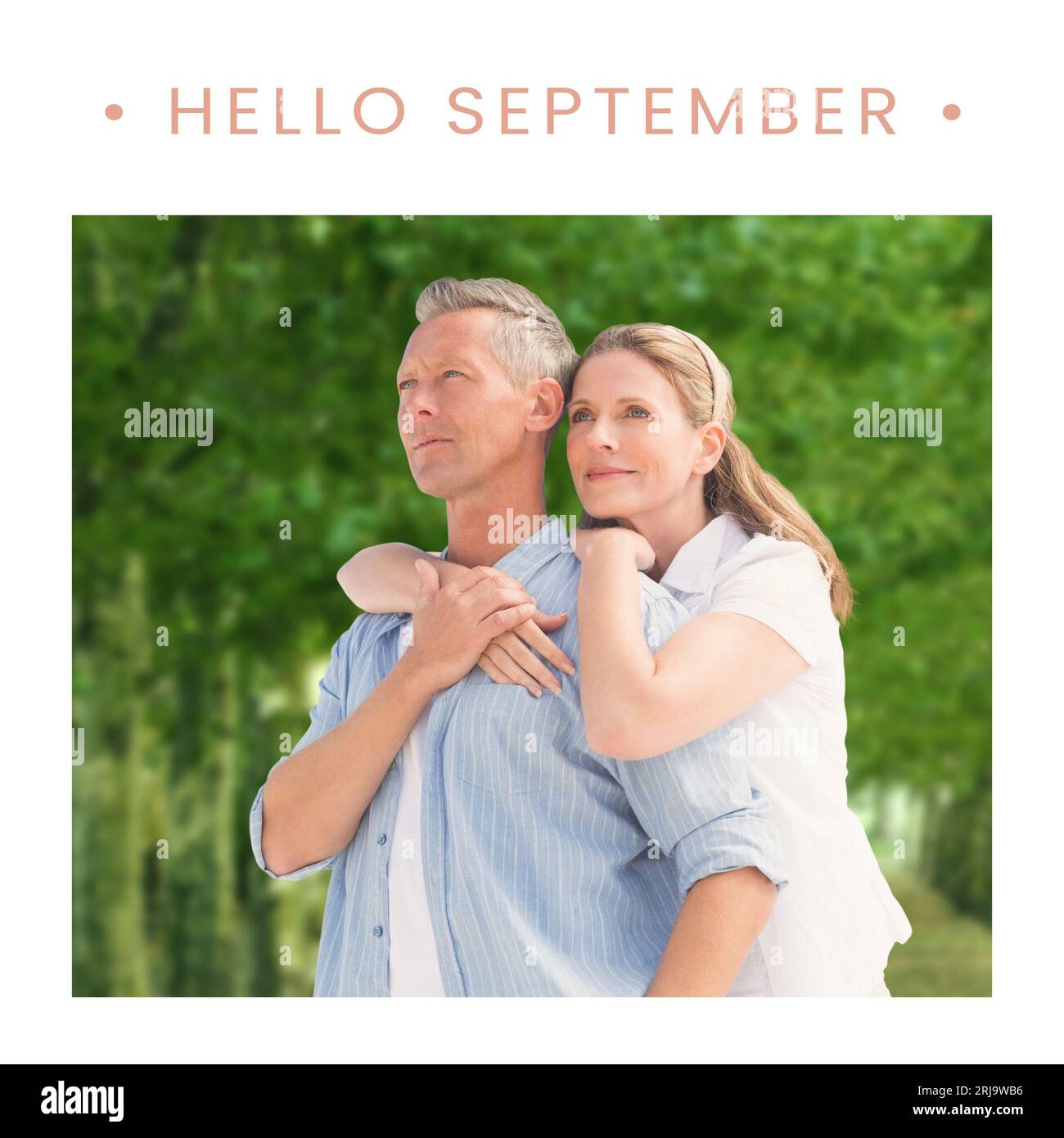 Composite of hello september text over caucasian couple in garden Stock ...