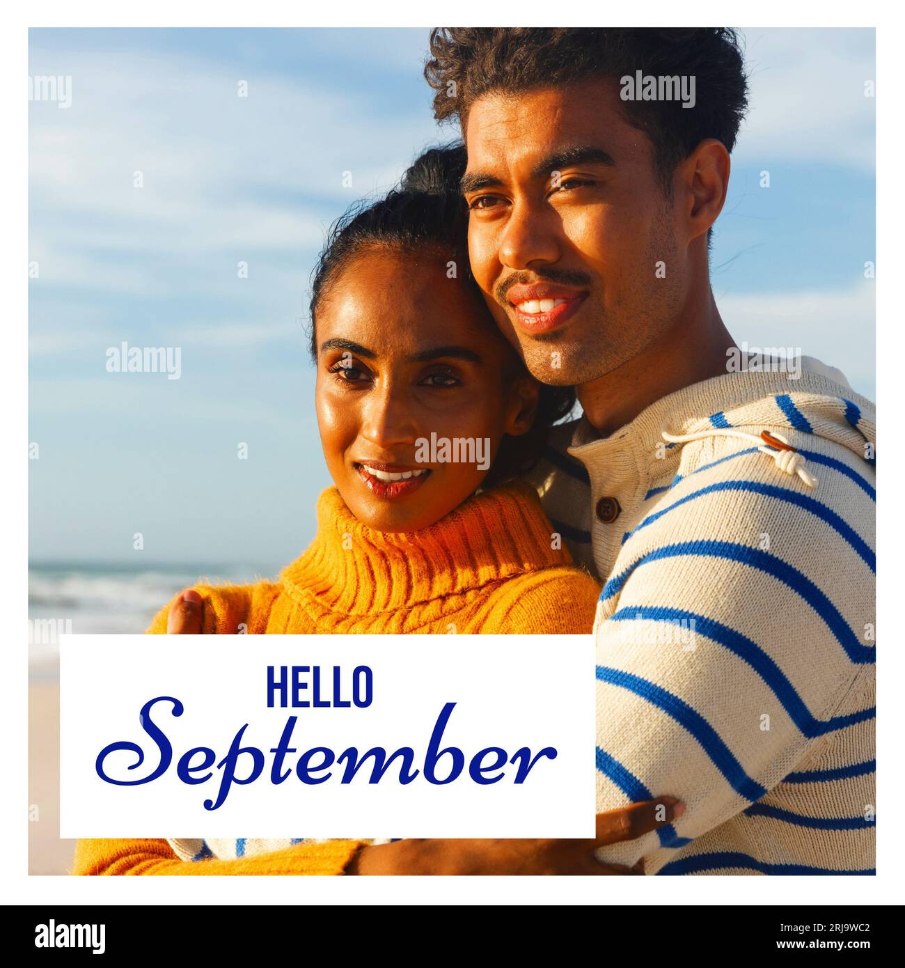 Composite of hello september text over biracial couple on beach Stock ...