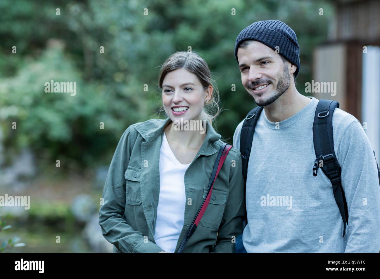 Foreign men and women touring a temple Stock Photo - Alamy