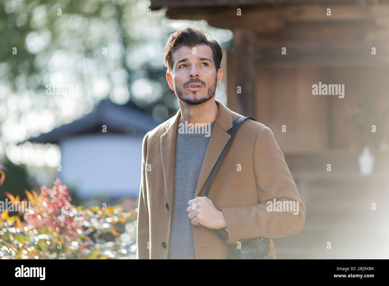 Foreign men and women touring a temple Stock Photo - Alamy