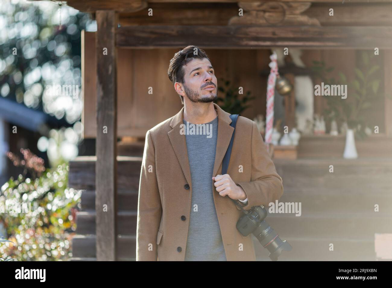 Foreign men and women touring a temple Stock Photo - Alamy