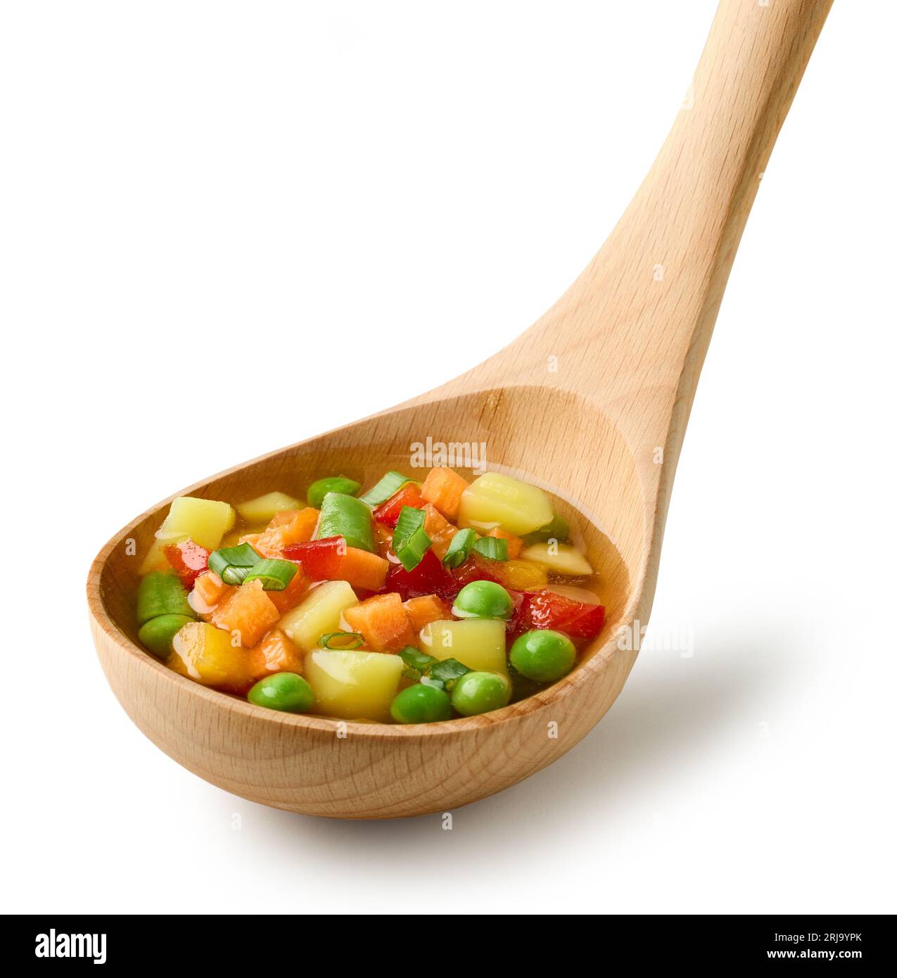 vegetable soup in wooden ladle isolated on white background Stock Photo ...