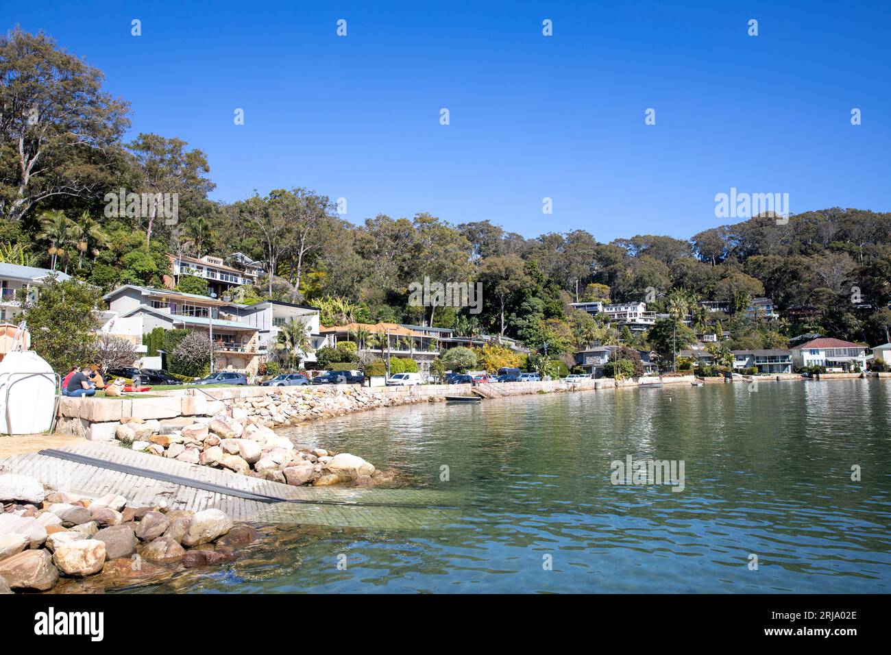 Australian waterfront homes at Careel Bay in Avalon with views across ...