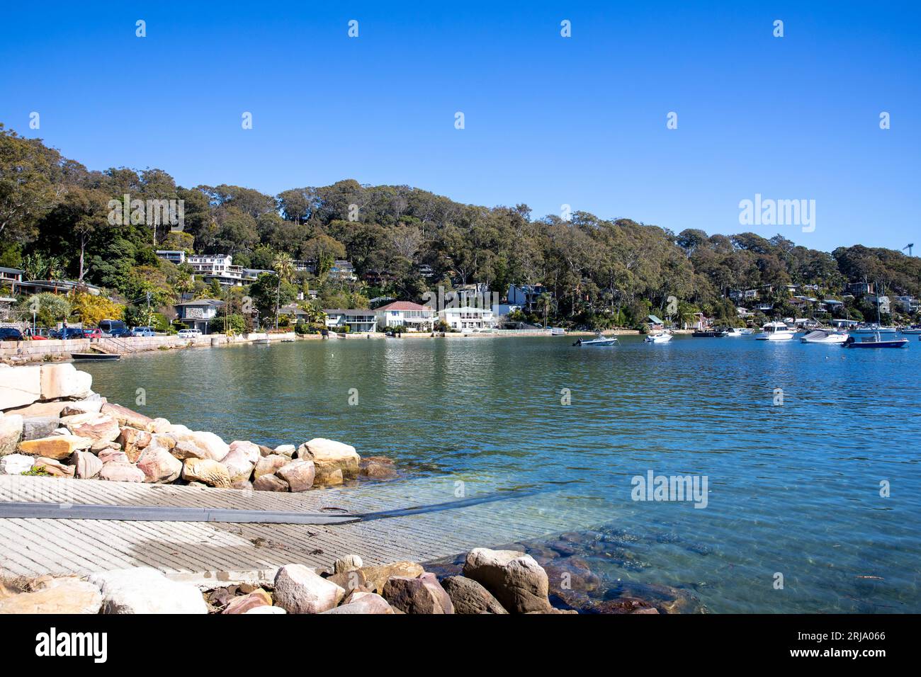 Australian waterfront homes at Careel Bay in Avalon with views across ...
