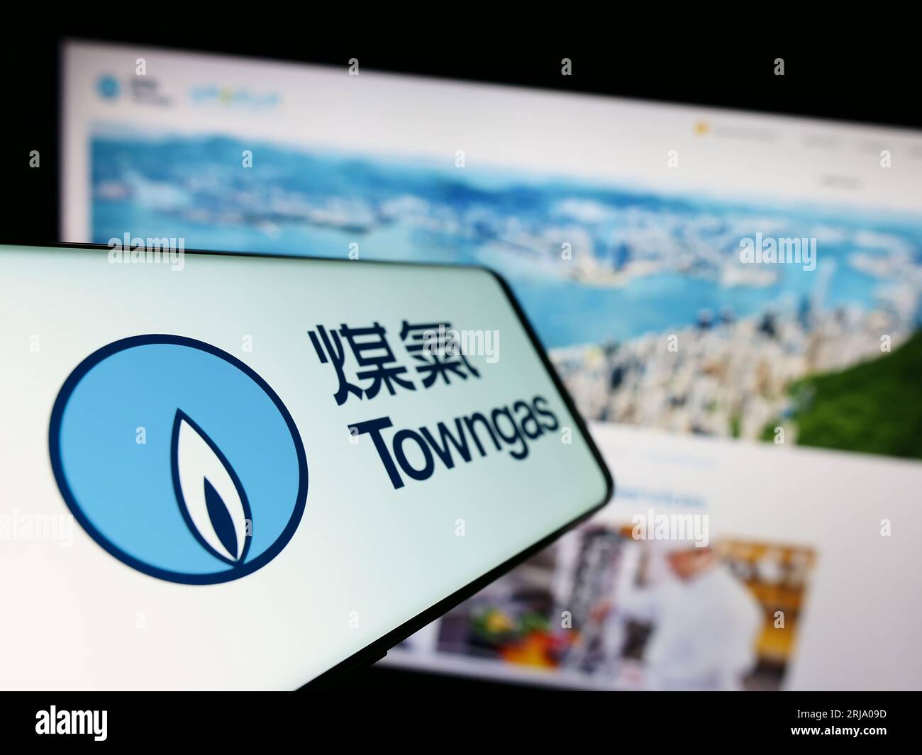 Smartphone with logo of The Hong Kong and China Gas Co. Ltd. (Towngas ...