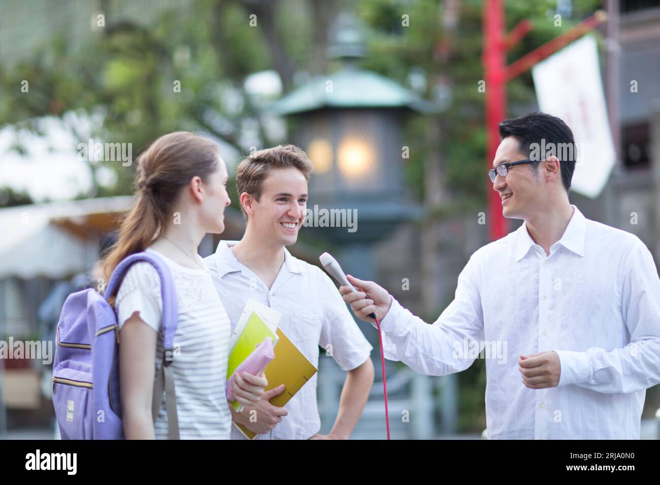 Foreign students being interviewed Stock Photo - Alamy