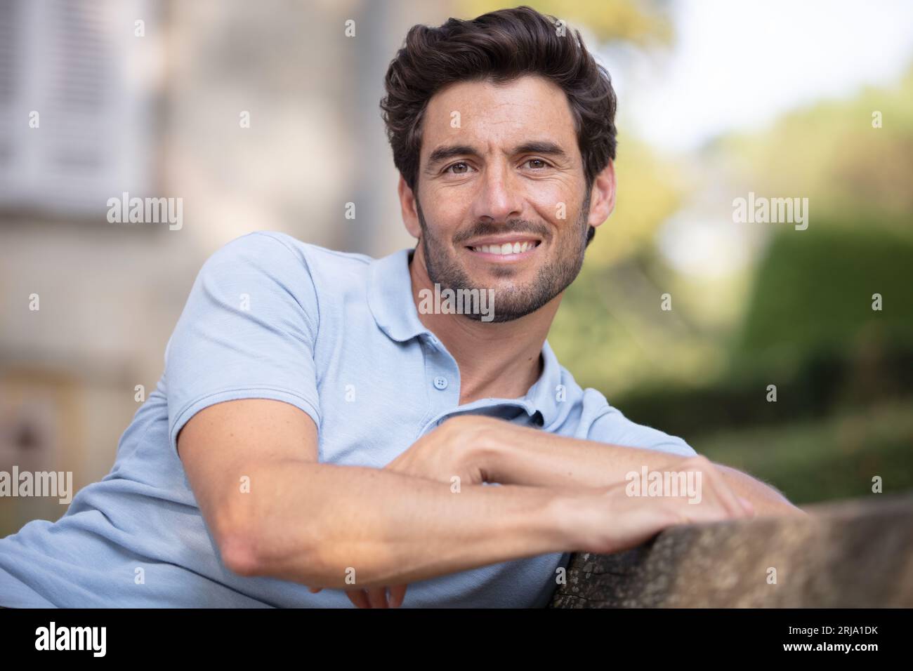 Male model posing on bench hi-res stock photography and images - Alamy