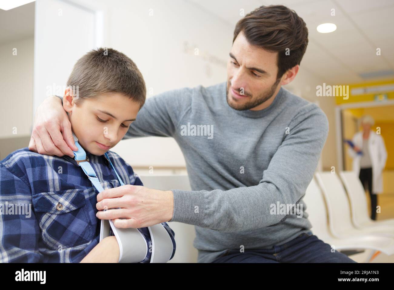 father holding sick son in the hospital Stock Photo - Alamy