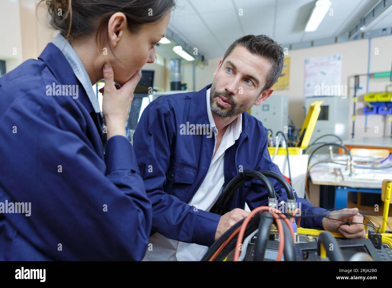 Modern factory two engineers hi-res stock photography and images - Alamy