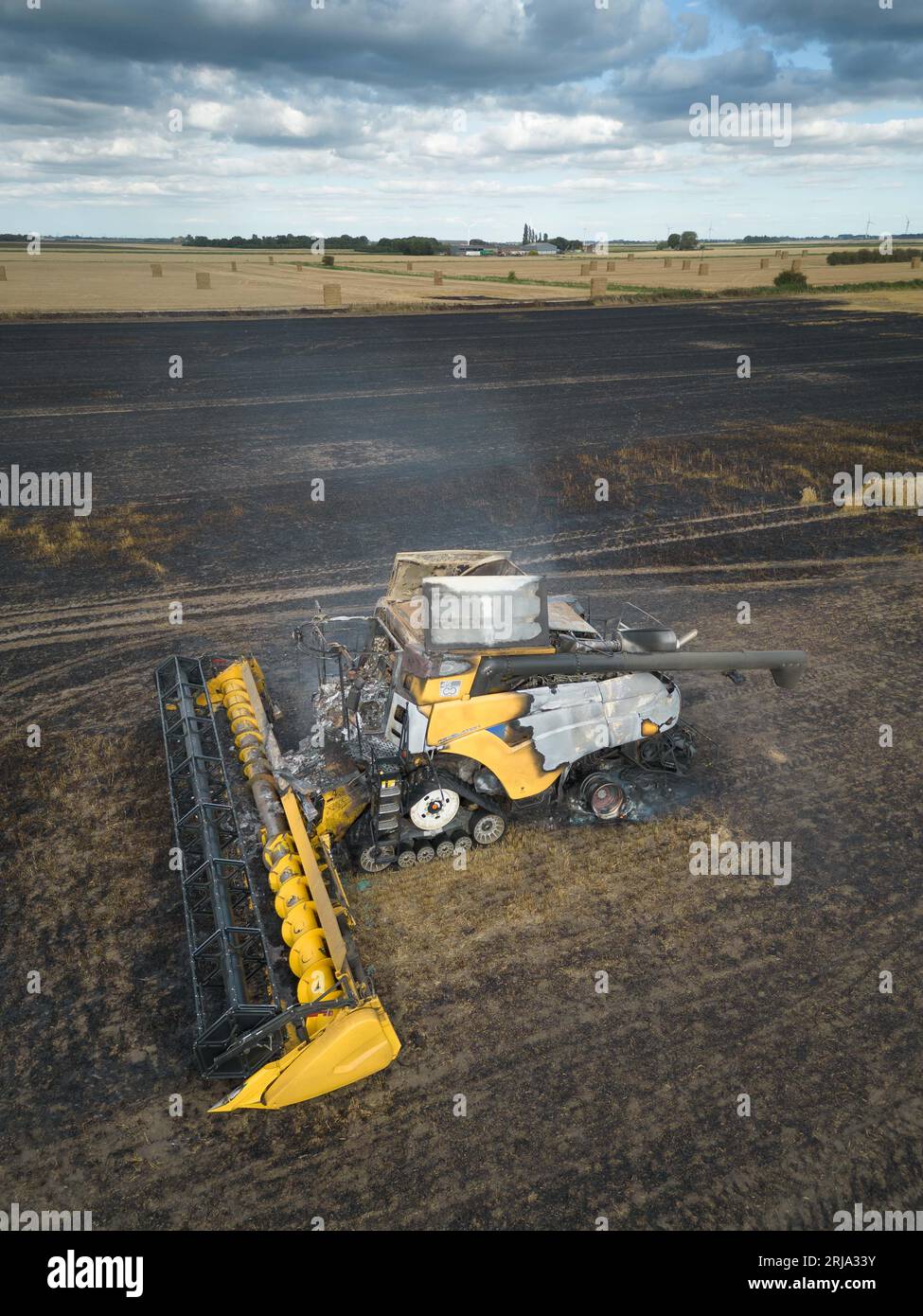 21st August 2023 Burnt-out combine harvester Stock Photo - Alamy