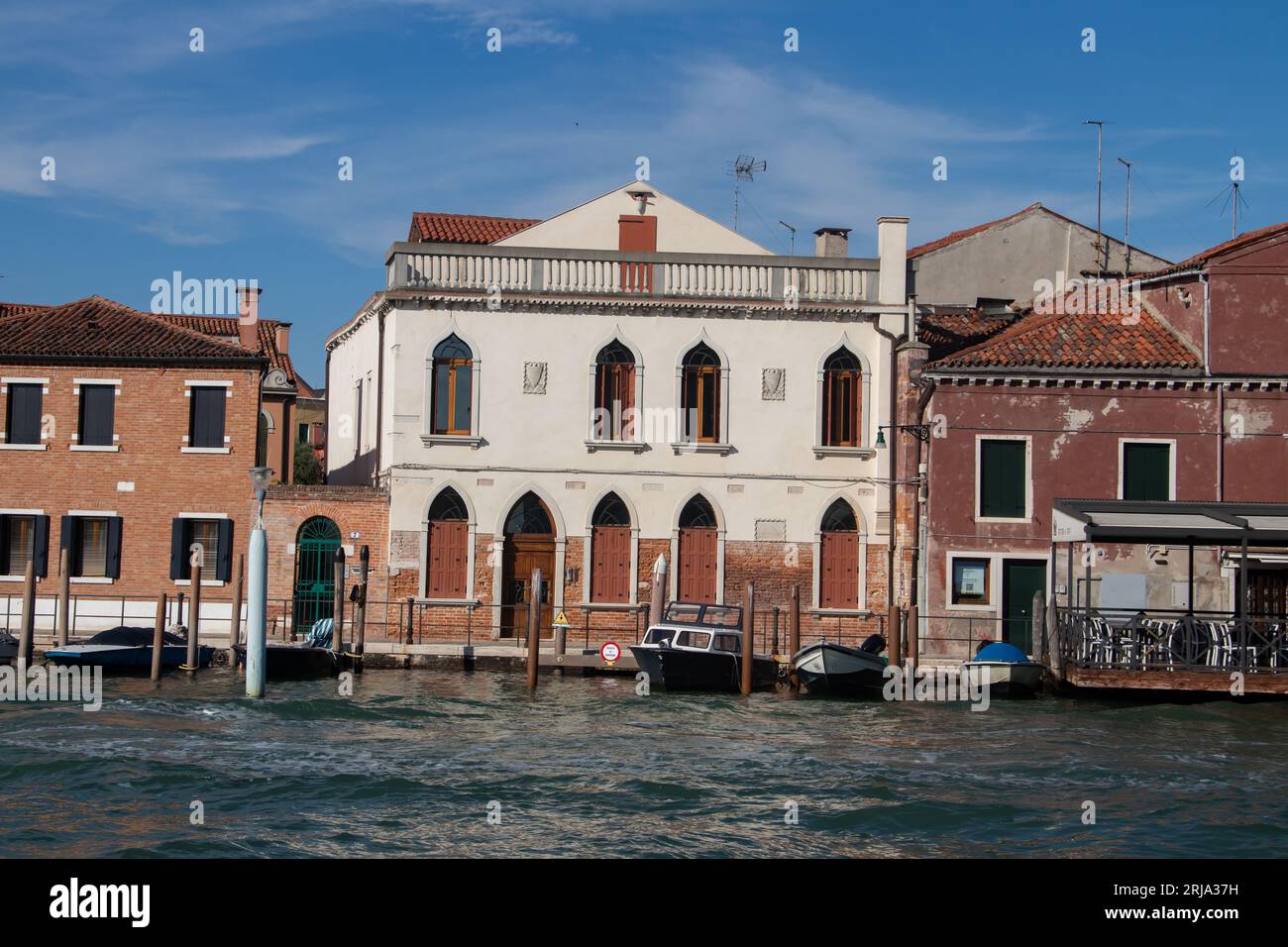 Channels and buildings around in Murano, Venice, Italy. Murano if world ...