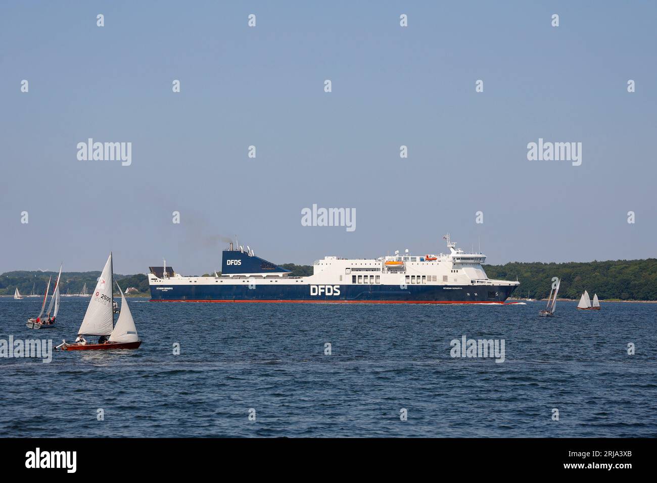 Sailiing race during the Kiel Week ,in the background ATHENA SEAWAYS, a ...