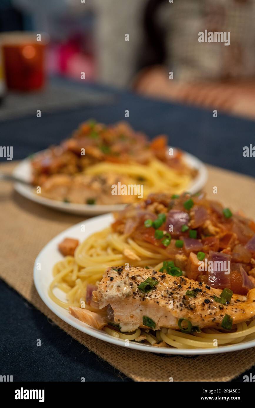 Delicious pasta topped with toppings Stock Photo - Alamy