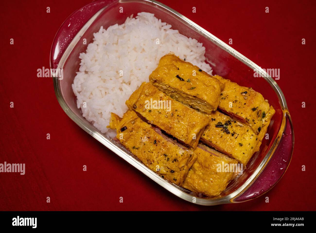 Delicious bento with eggs bacon and rice Stock Photo - Alamy
