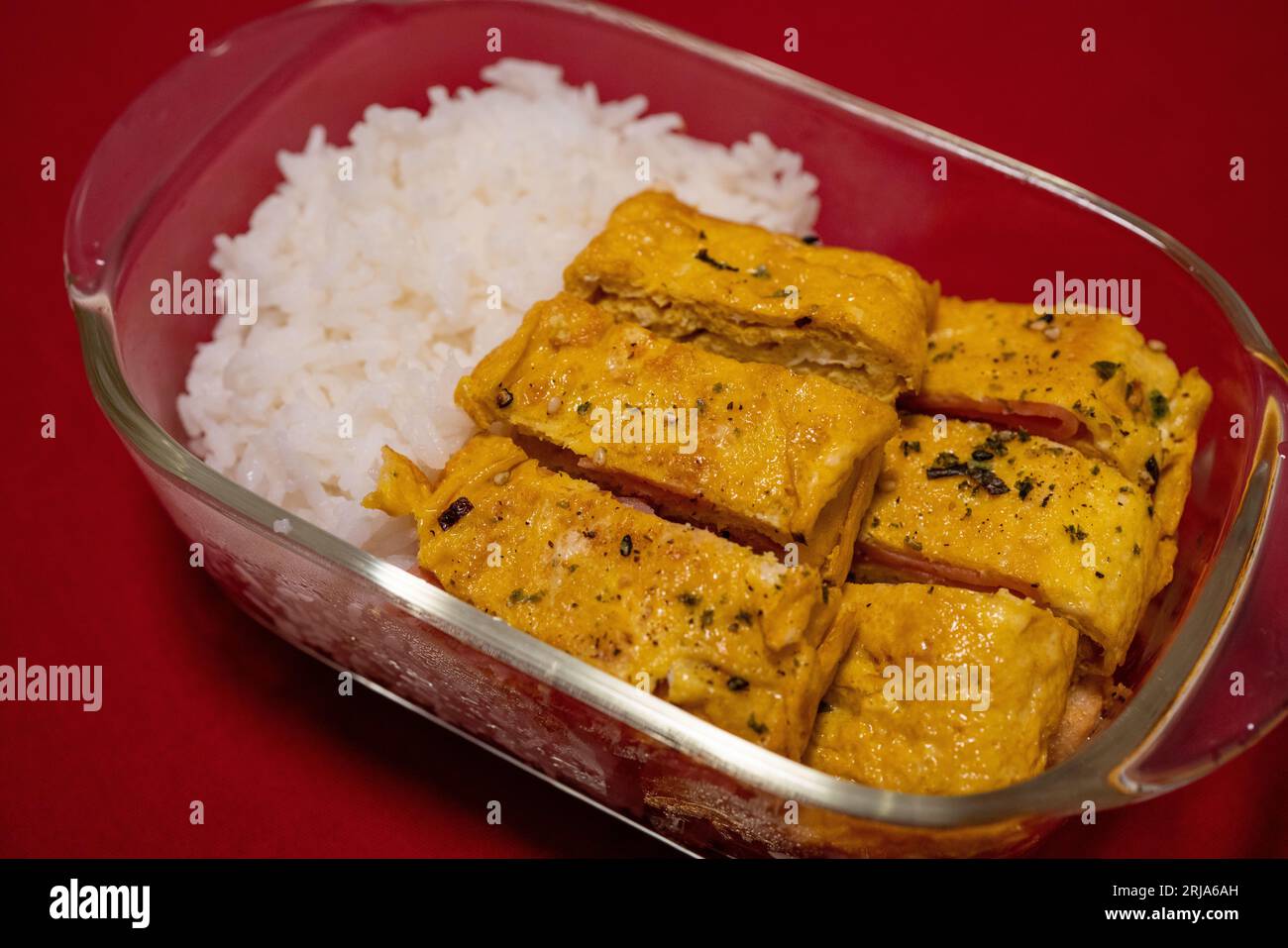 Delicious bento with eggs bacon and rice Stock Photo - Alamy