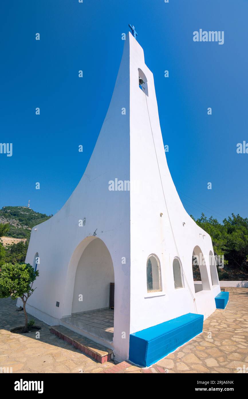 White church in Potami beach with azure sea water, Samos island, Greece ...