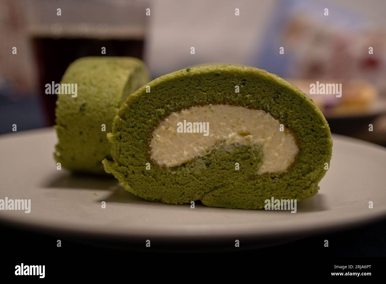 Delicious matcha cake roll Stock Photo - Alamy