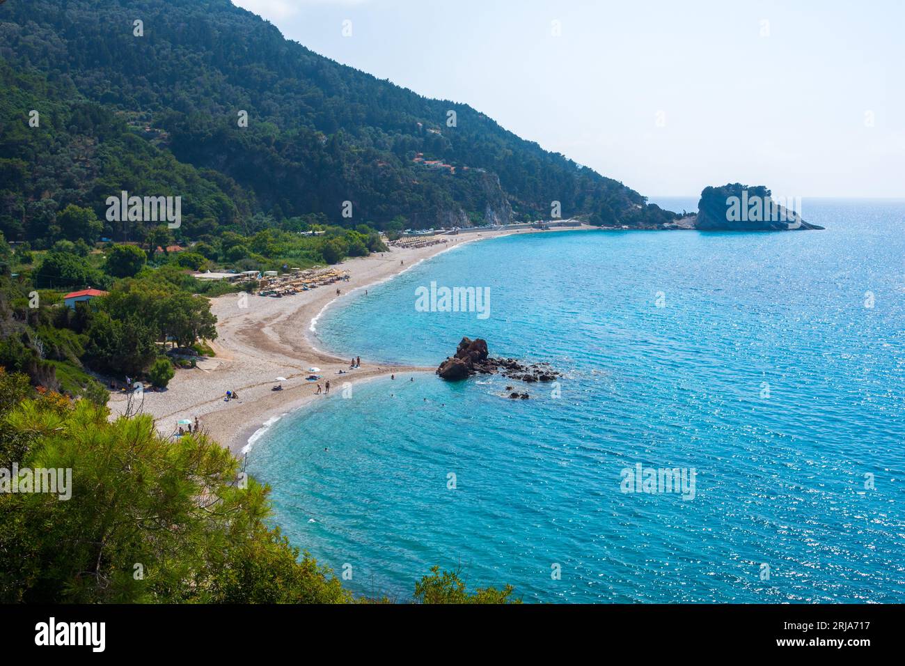 White church in Potami beach with azure sea water, Samos island, Greece ...