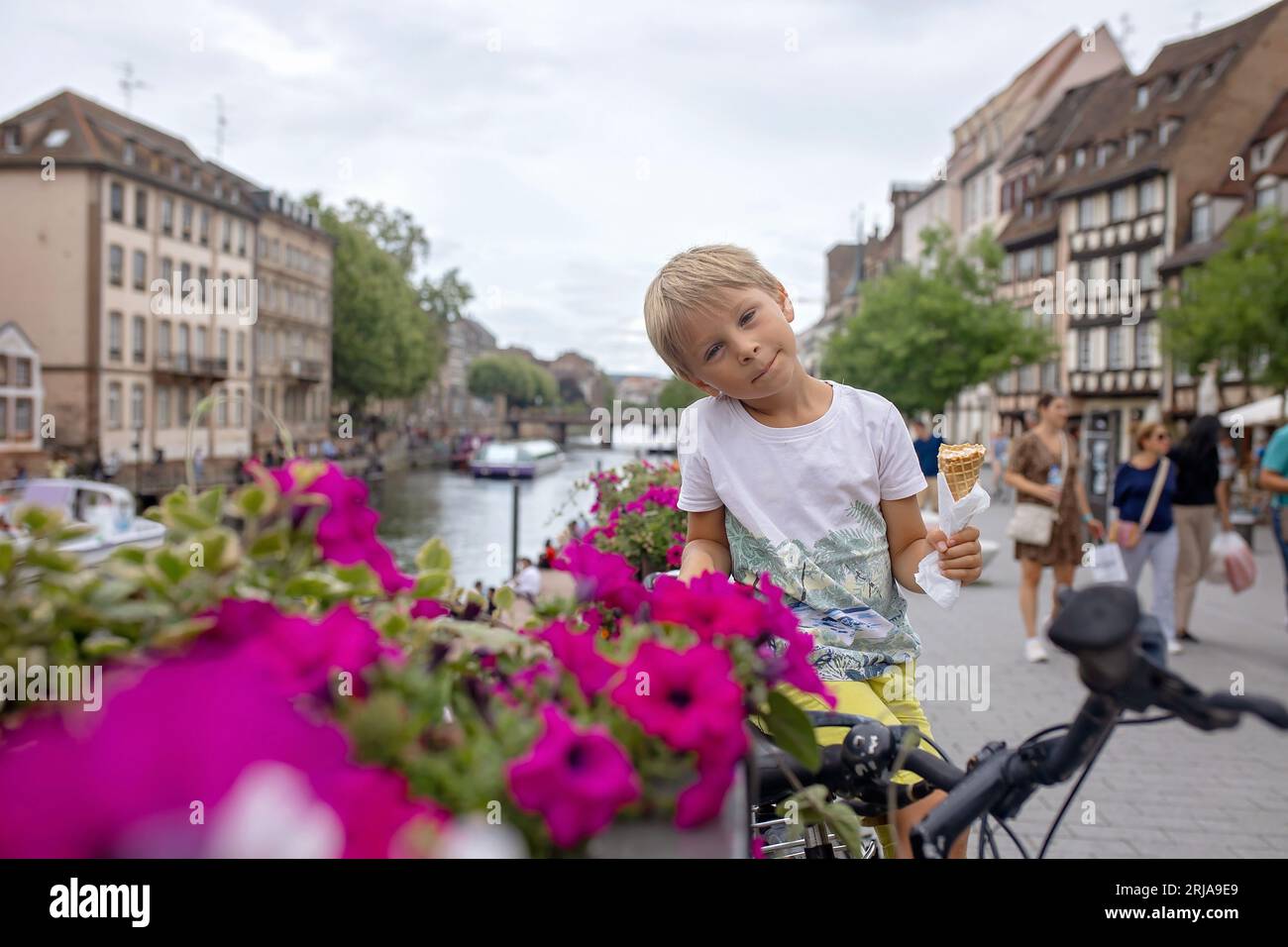 Beautiful family with children, boys, visiting Strasbourg in France ...