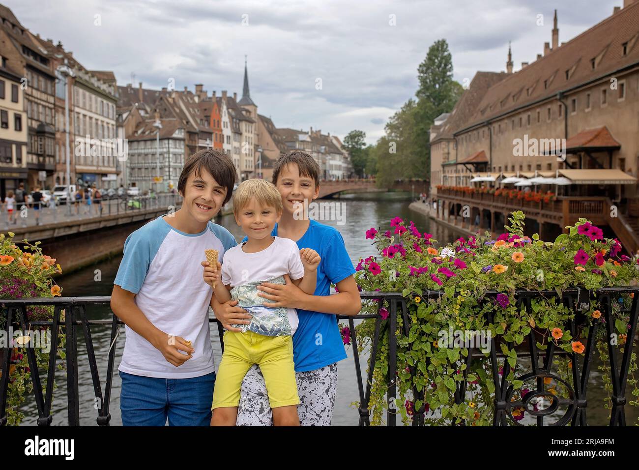 Beautiful family with children, boys, visiting Strasbourg in France ...