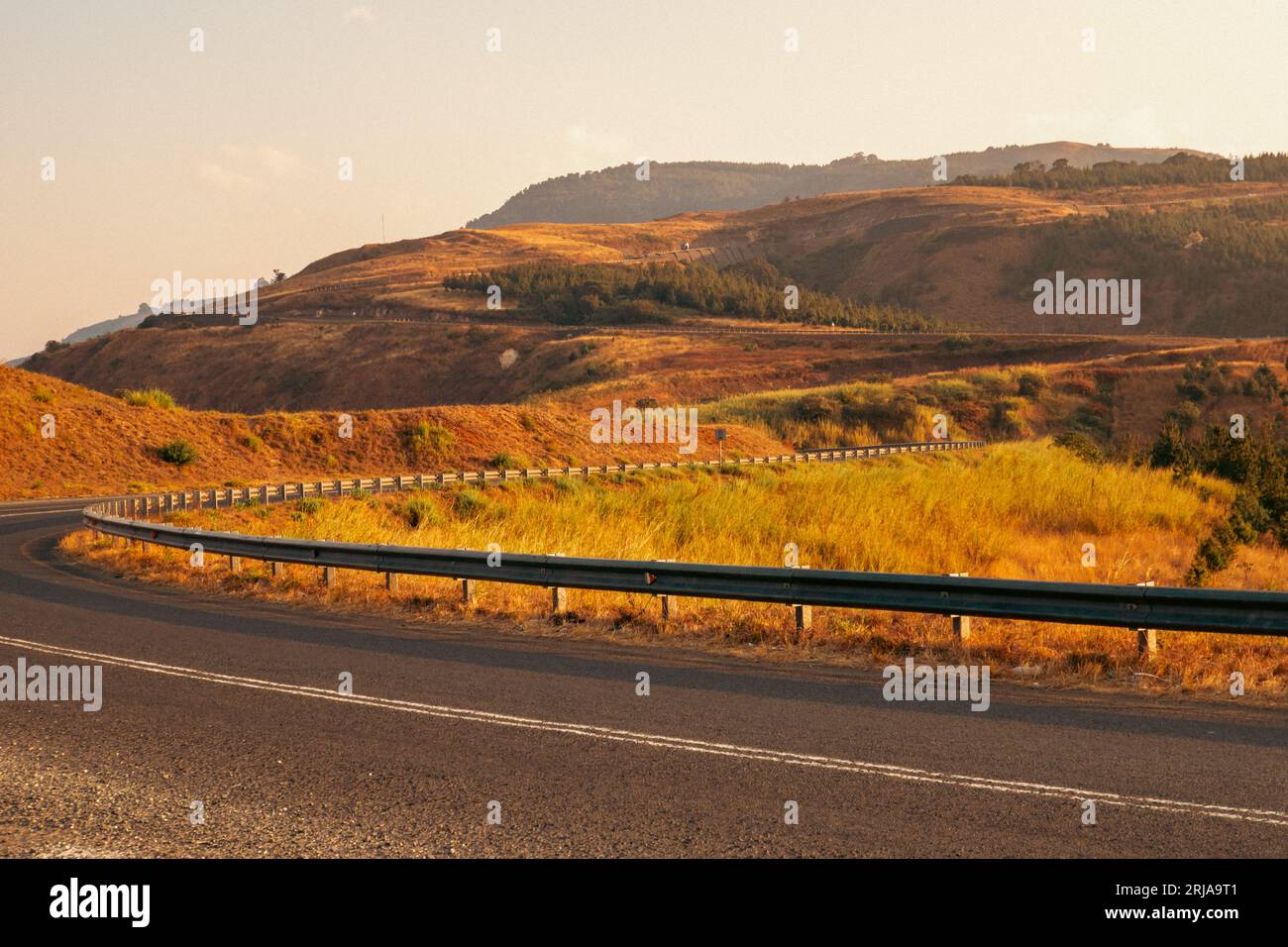 Scenic view of a meandering road at the Rift Valley View Point in Mbeya ...