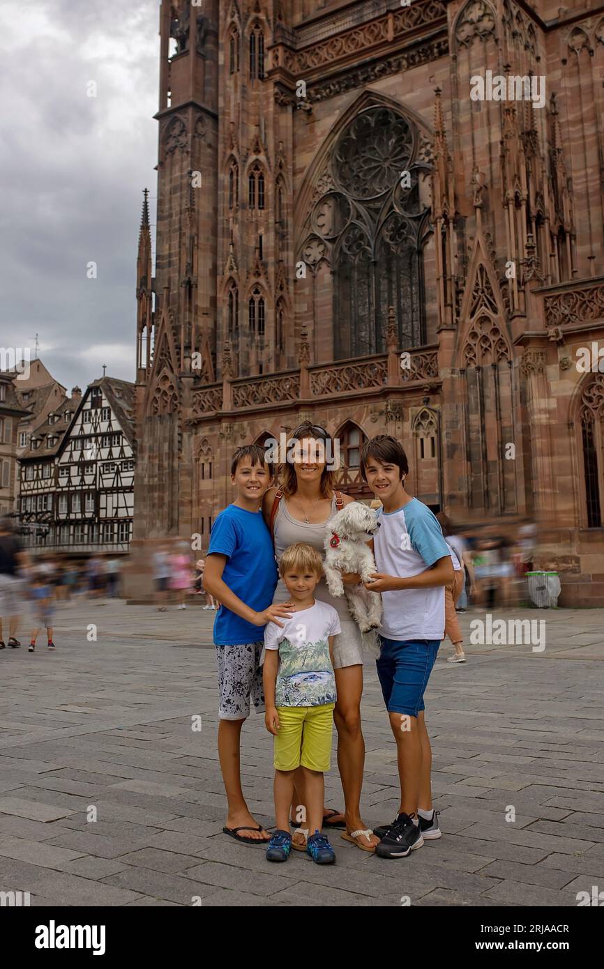 Beautiful family with children, boys, visiting Strasbourg in France ...