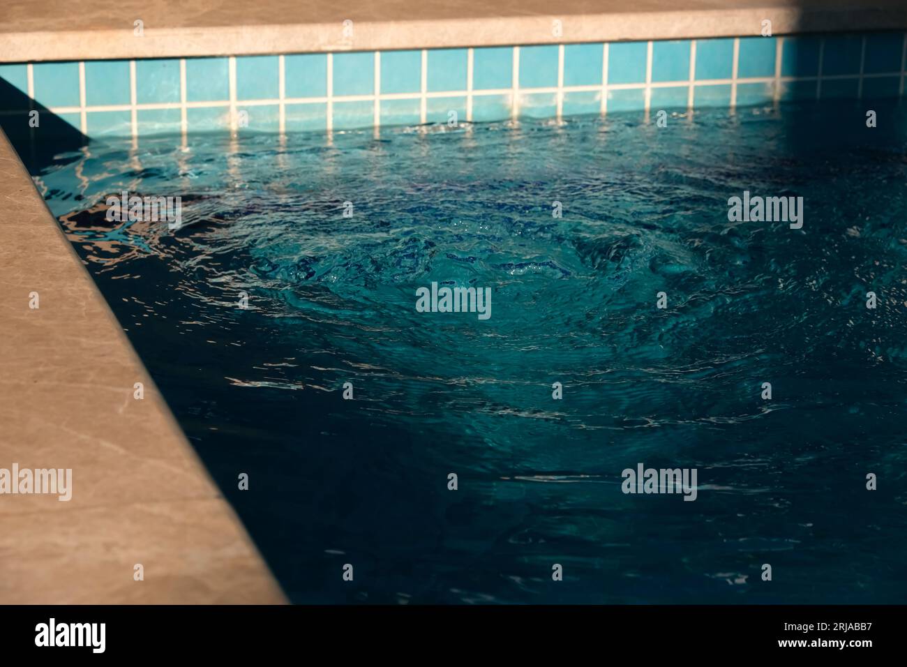 Blue Swimming Pool. Spa corner in the pool. Outdoor Swimming Pool ...