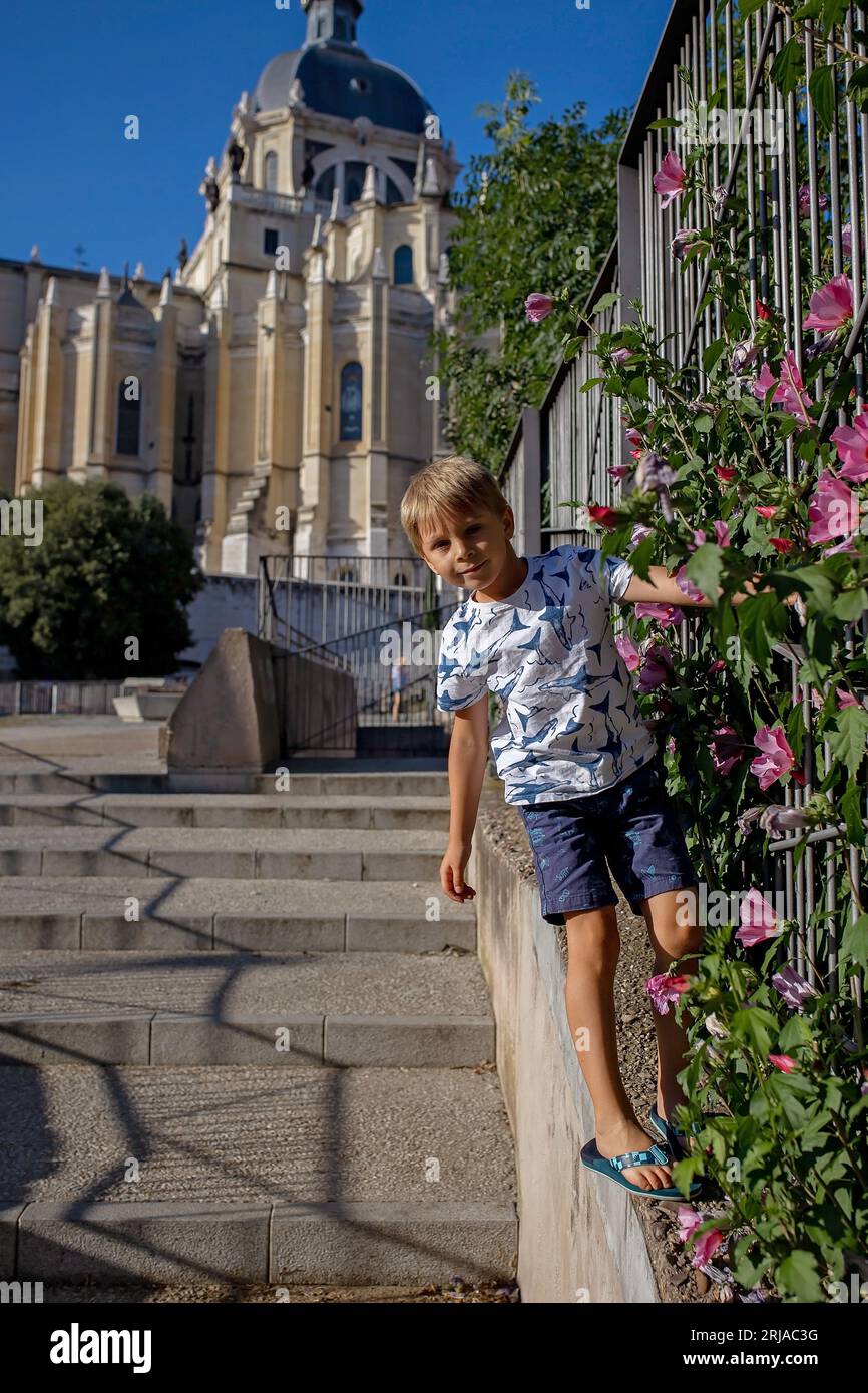 Family with children, siblings, visiting Madrid during family vacation ...