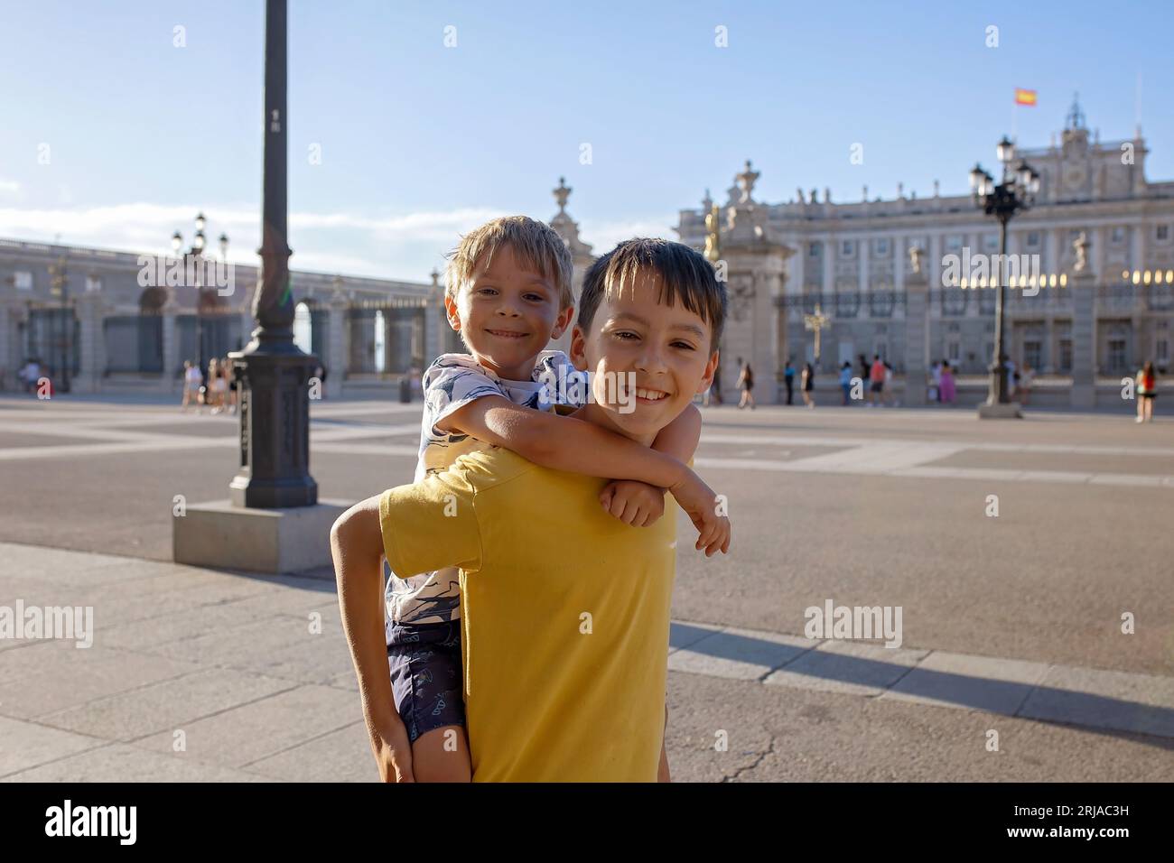 Family with children, siblings, visiting Madrid during family vacation ...