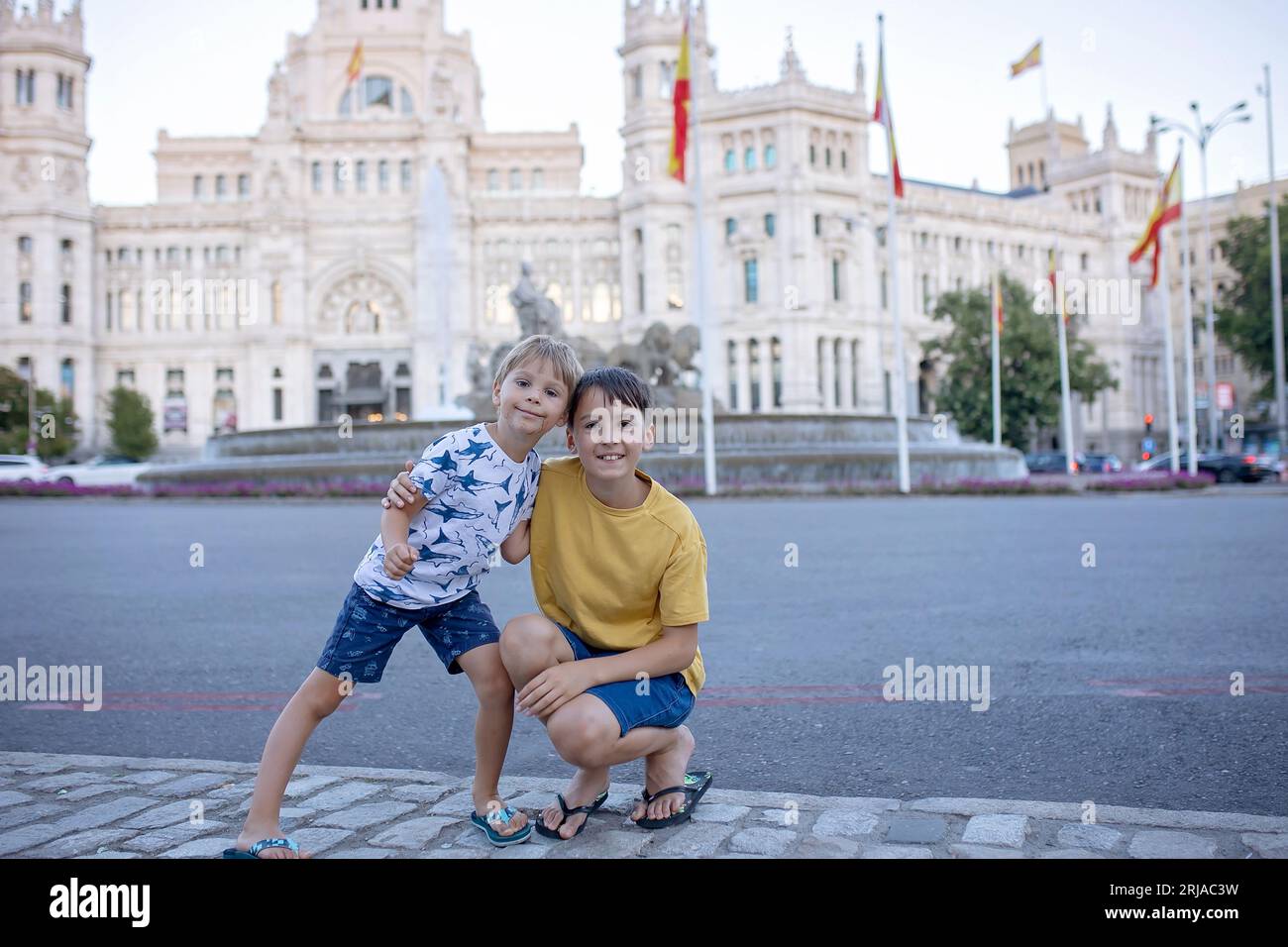 Family with children, siblings, visiting Madrid during family vacation ...