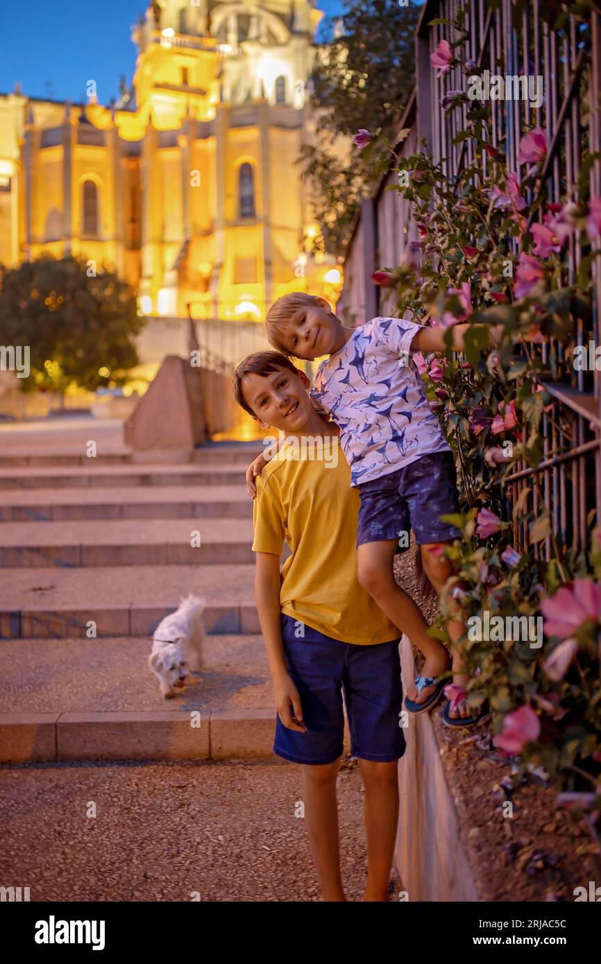 Family with children, siblings, visiting Madrid during family vacation ...