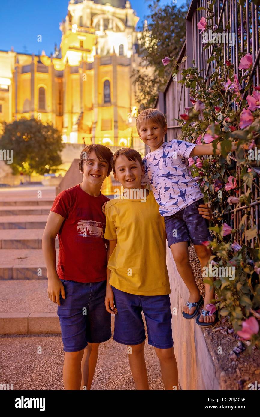 Family with children, siblings, visiting Madrid during family vacation ...