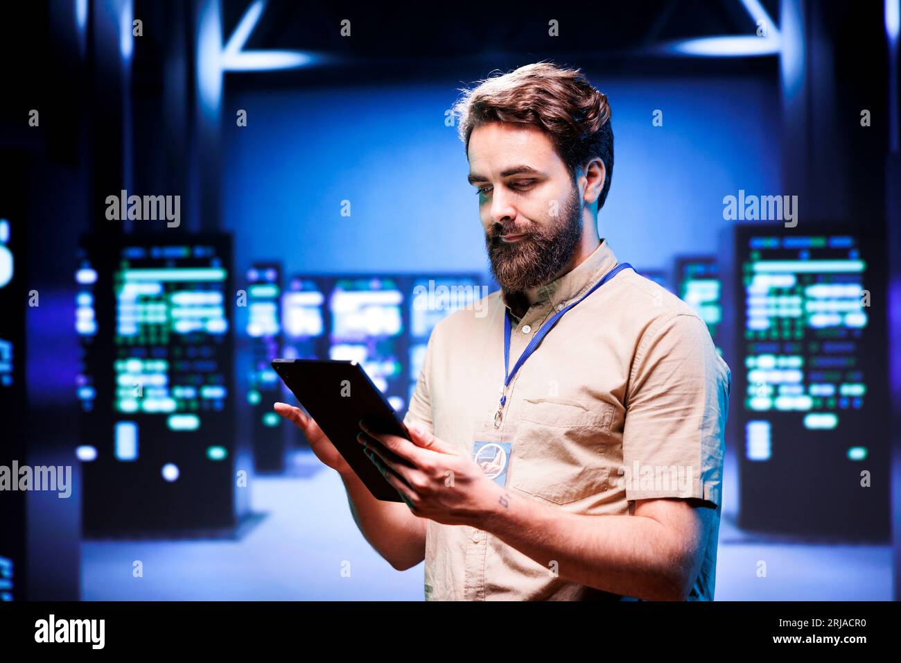 Administrator in front of server rackmounts delivering web content to ...