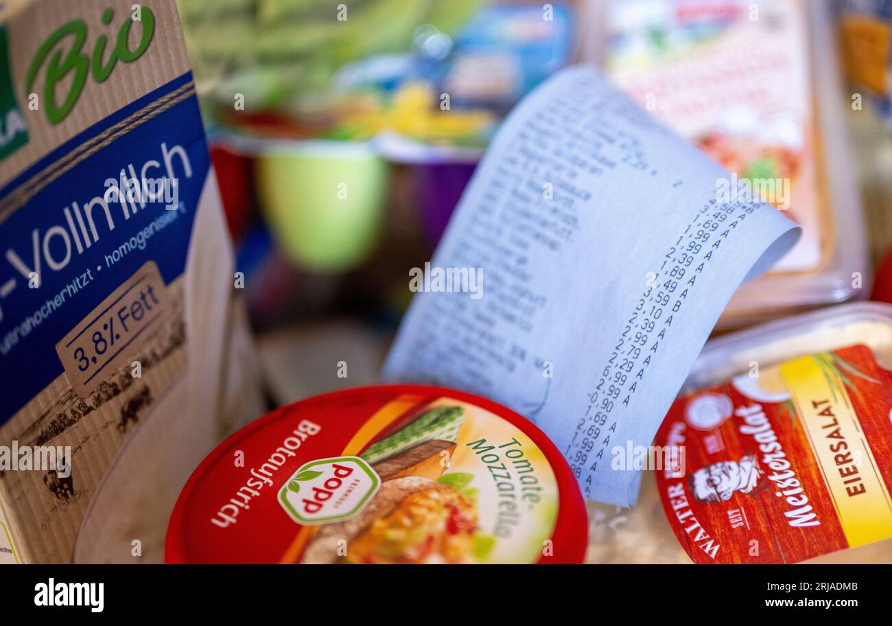 Berlin, Germany. 21st Aug, 2023. A receipt lies in a shopping basket ...