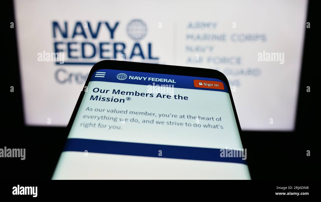 Smartphone with website of financial instituation Navy Federal Credit ...