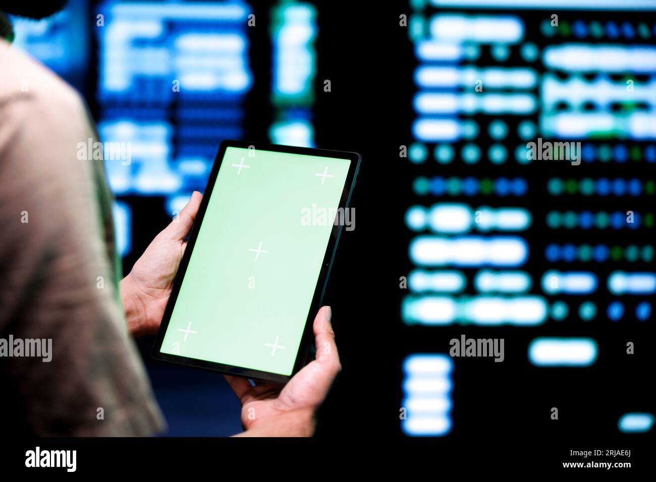 Admin using green screen tablet to do maintenance on high bandwidth ...