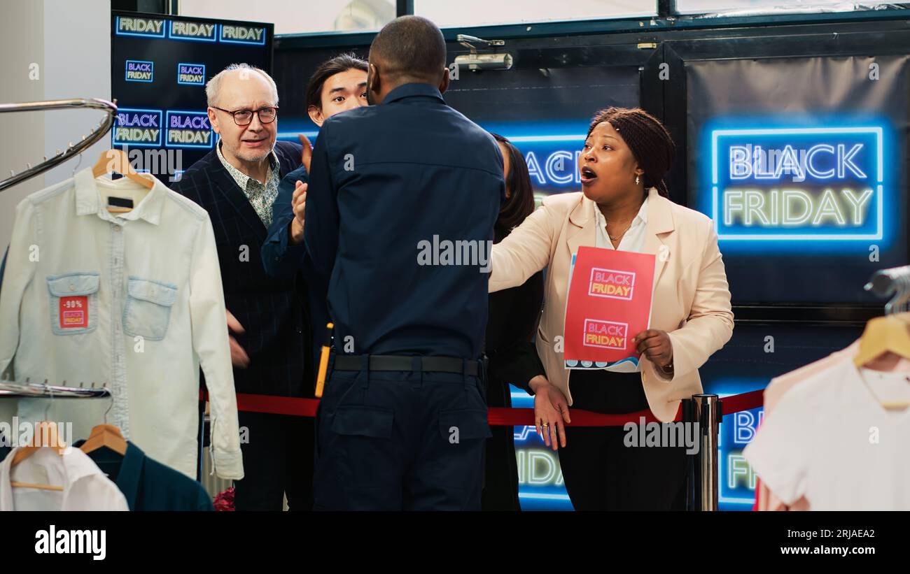 Impatient shoppers waiting in line for black friday big sales, pushing ...