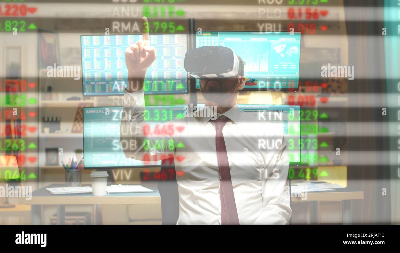 Trader examining stock market charts hi-res stock photography and ...