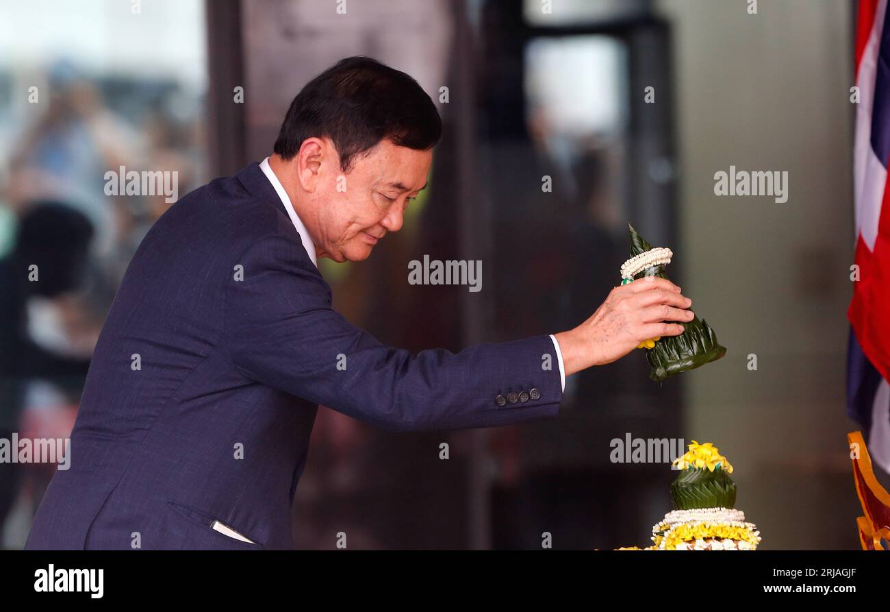 Bangkok, Thailand. 22nd Aug, 2023. Former Thai Prime Minister Thaksin Shinawatra prays in front ...