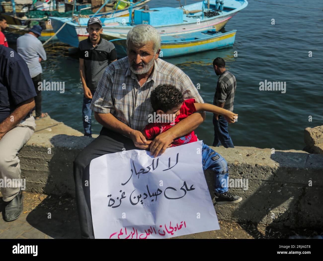 August 22, 2023, Gaza City, The Gaza Strip, Palestine: Protesters lift ...