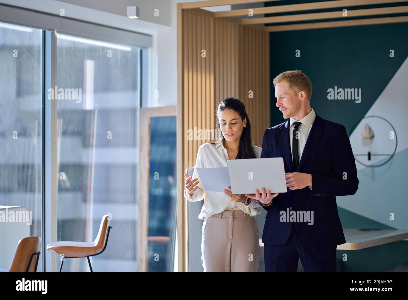 Diverse business people walking documents hi-res stock photography and ...