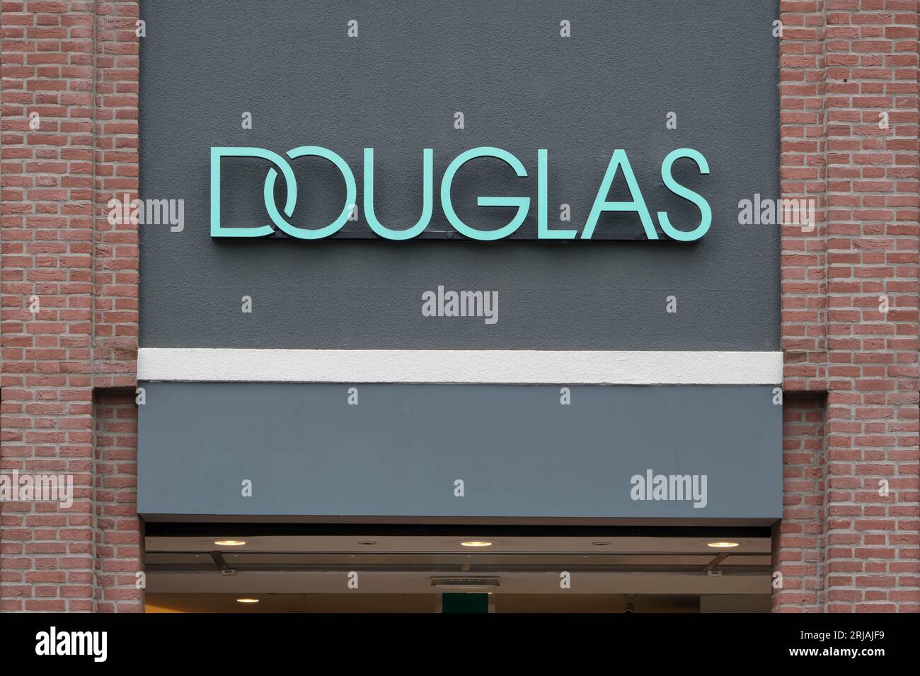 Green Douglas logo on a shop facade. Douglas is one of the largest ...