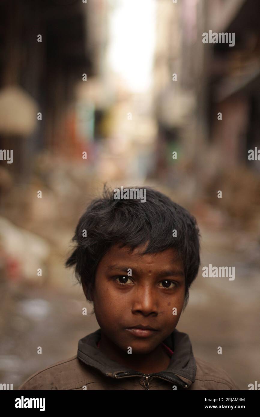 Portrait of an Indian boy in slum Stock Photo - Alamy