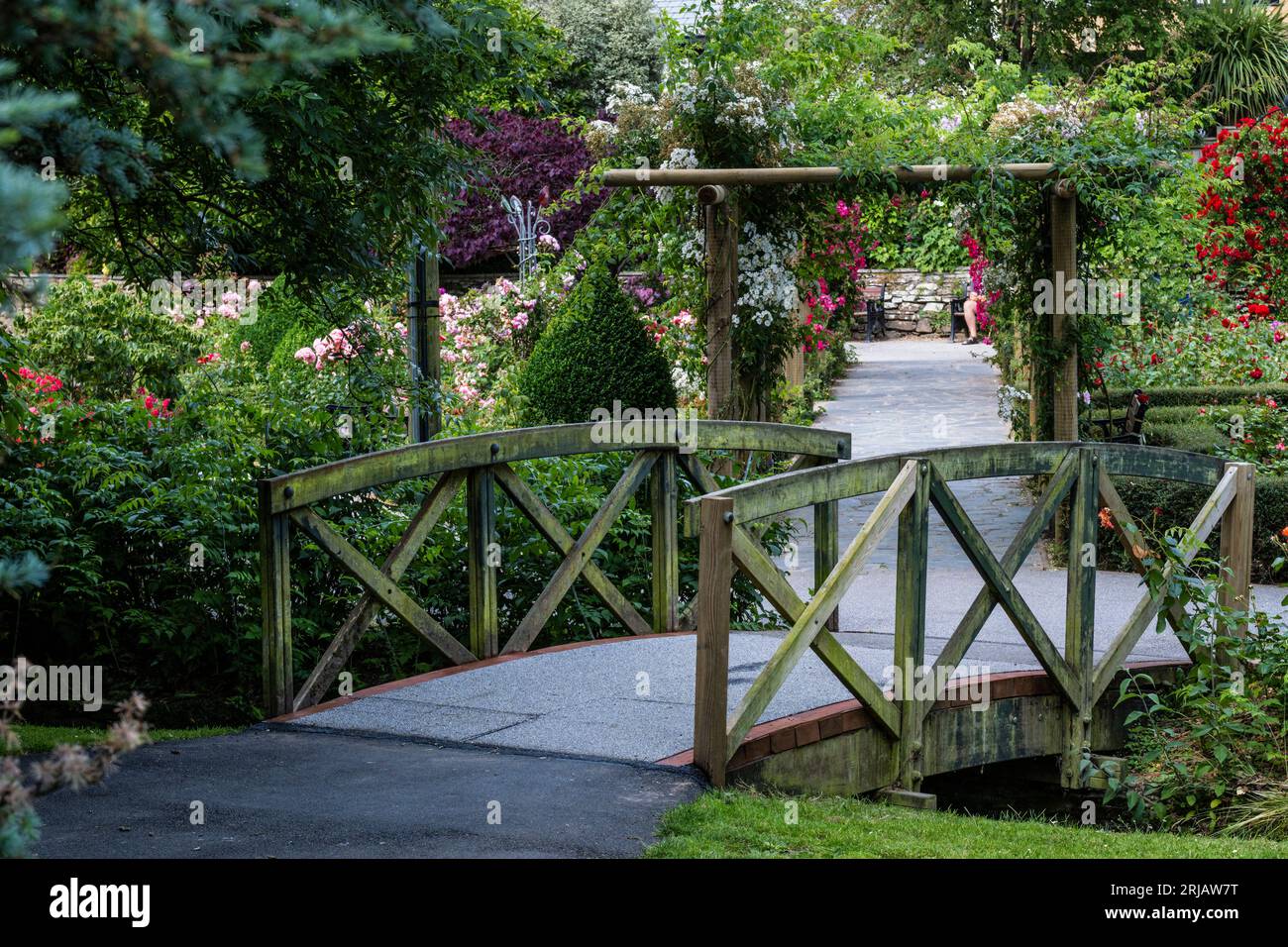 The wooden footbridge leading to the Rose Garden in Trenance Gardens in ...