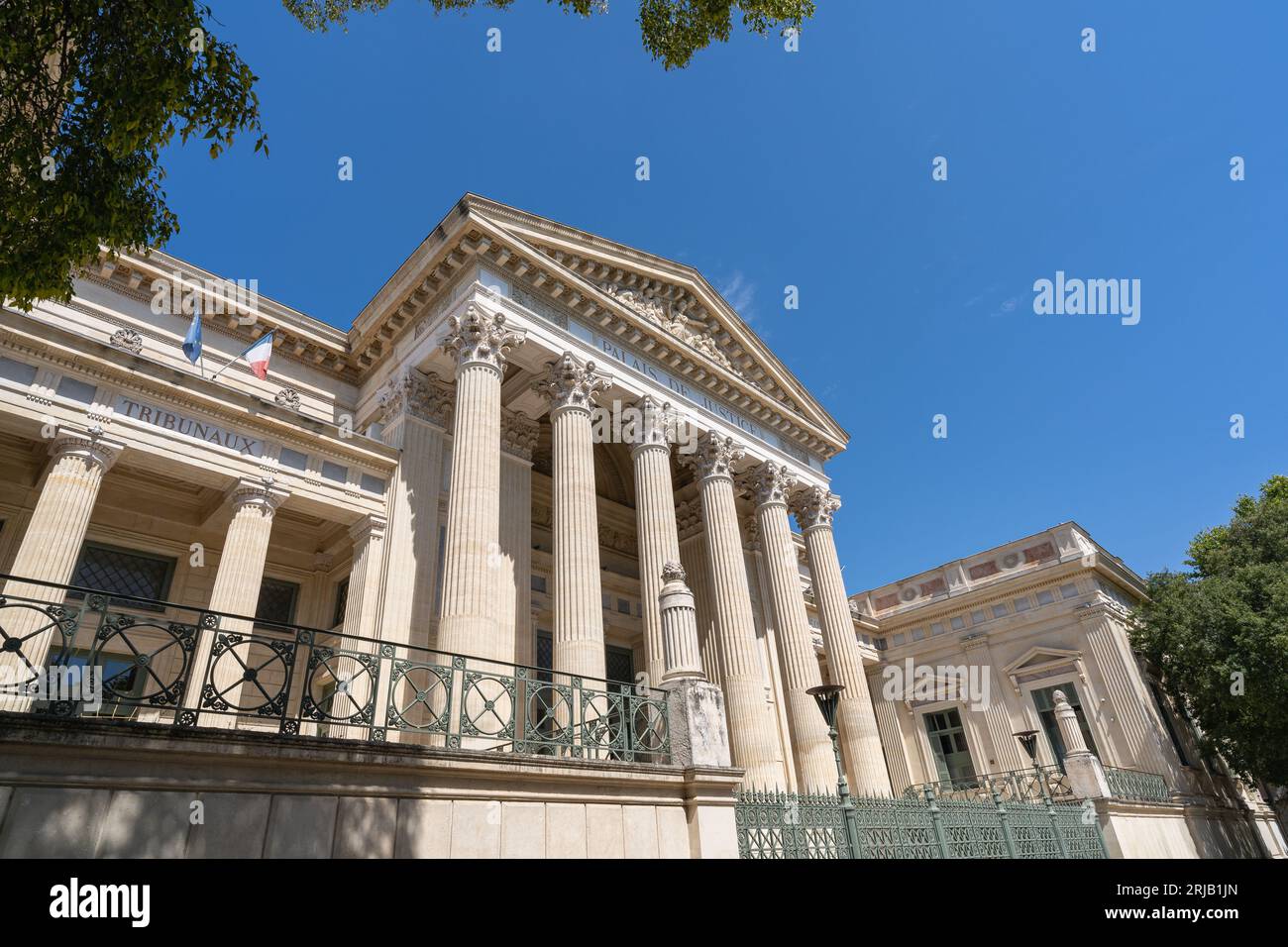 Nîmes, Gard, France - 08 17 2023 : Low angle view of the classical ...